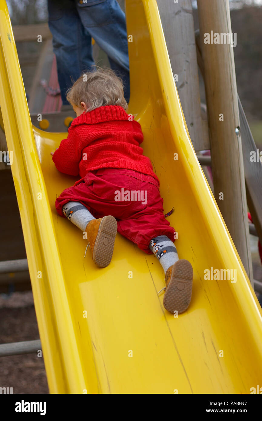 little boy on slide Stock Photo - Alamy