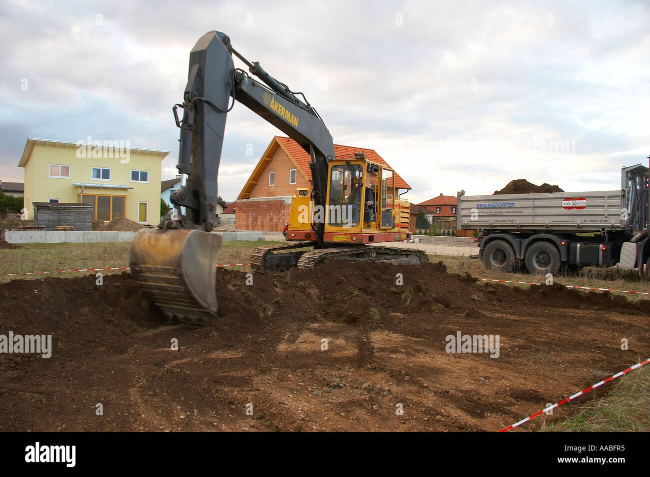 digger / excavator / excavation of basement Stock Photo - Alamy