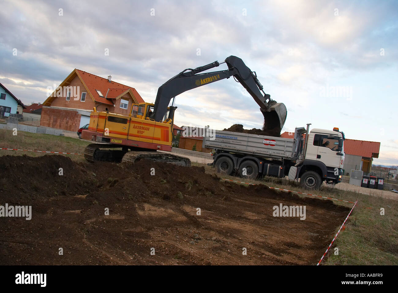 digger / excavator / excavation of basement Stock Photo - Alamy