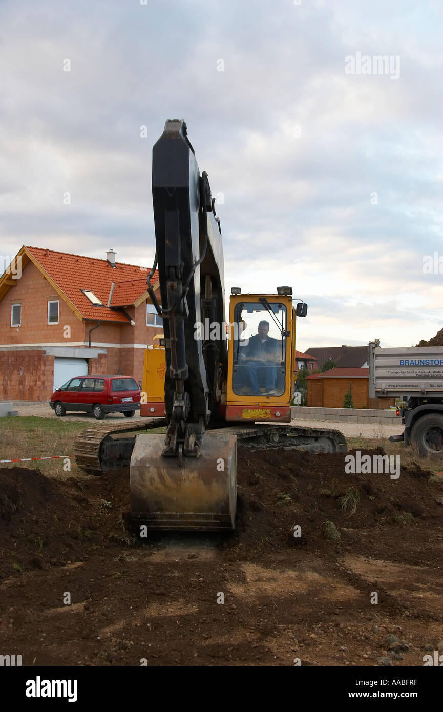 digger / excavator / excavation of basement Stock Photo - Alamy