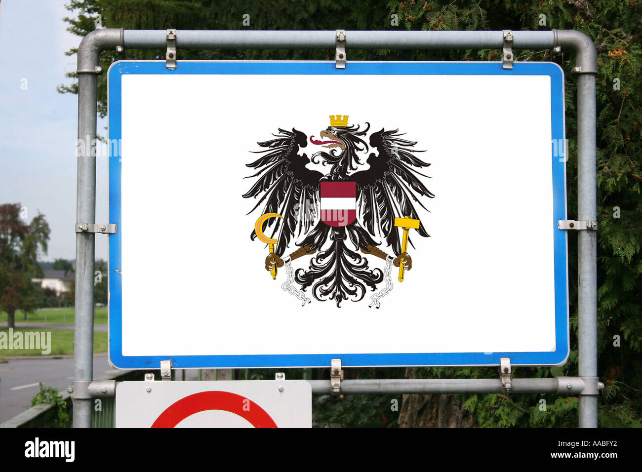 town sign with austrian eagle Stock Photo - Alamy