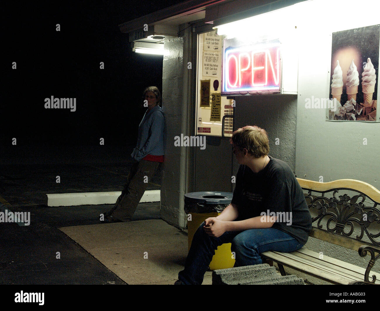 Two young people catch each other s eye outside the corner store just ...