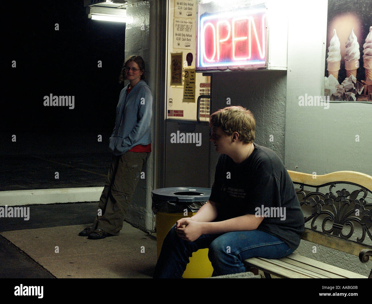 Two young people catch each other s eye outside the corner store just ...