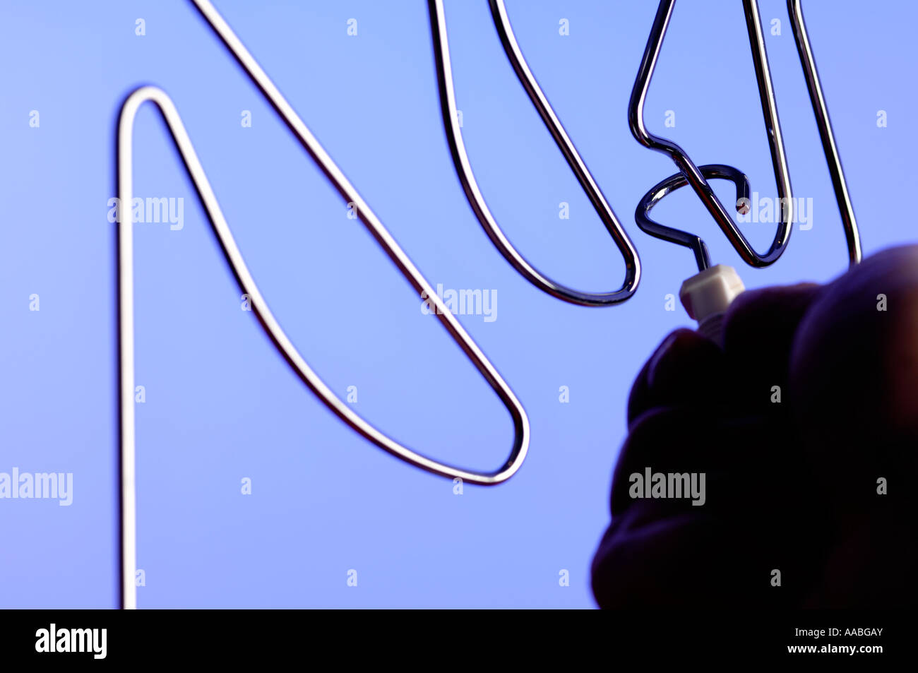 Steady hand wire toy Stock Photo - Alamy