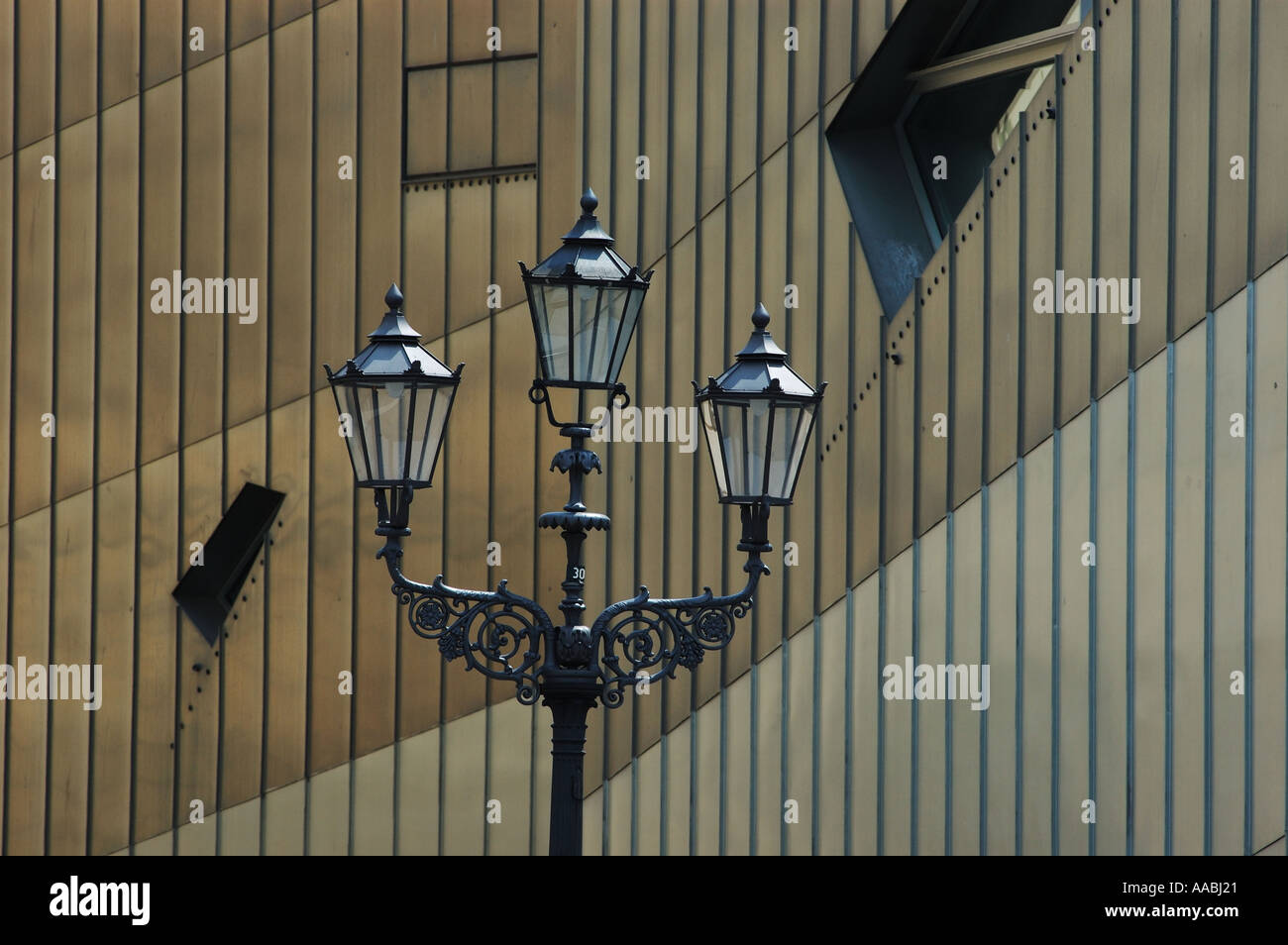 Old fashioned street lamp in front of facade of Berlin Jewish museum ...