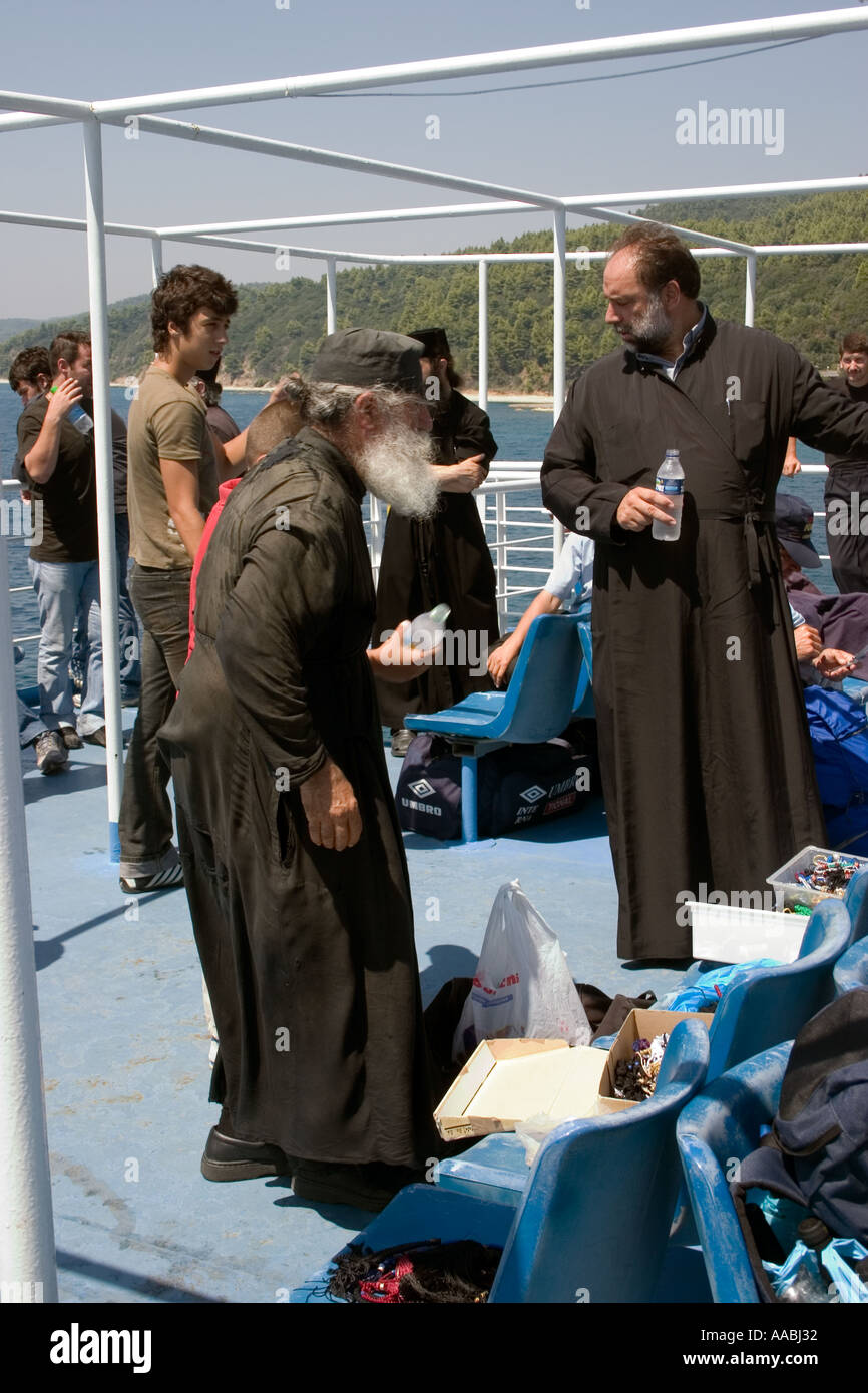monks at the boat Stock Photo - Alamy