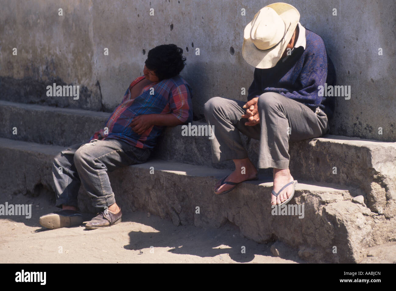 Two men resting during siesta time at Santiago Atitlan Guatemala Stock ...