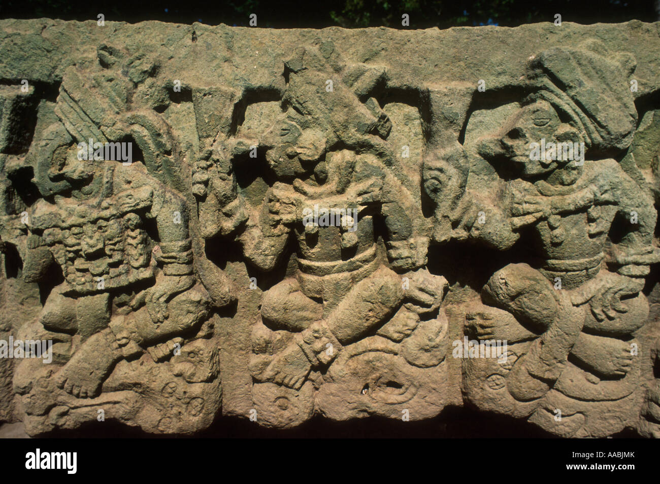 Relief sculpture depicting figures stands on an altar in the ruins of ...