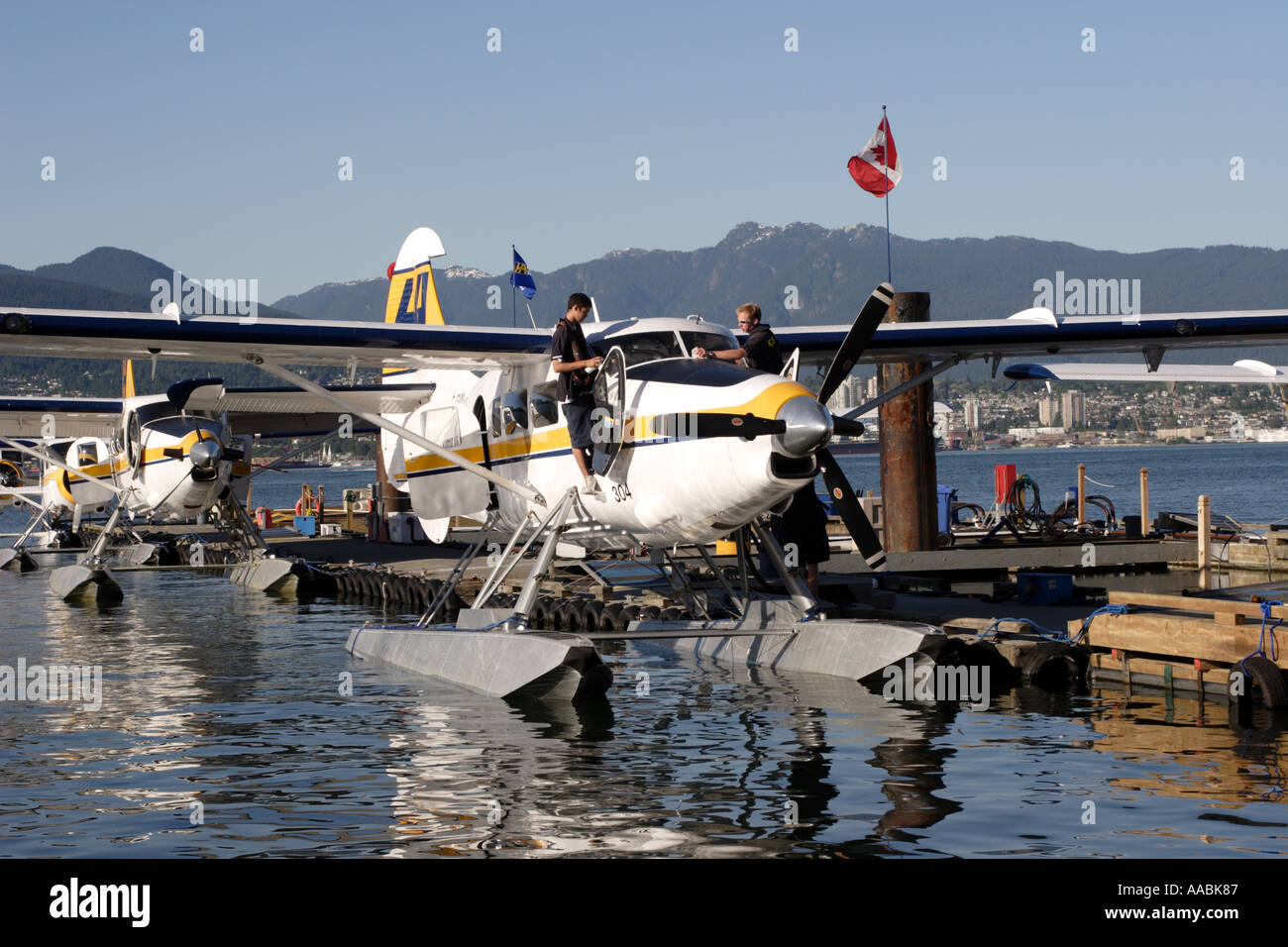Float planes being cleaned up in Vancouver Harbour Vancouver British ...
