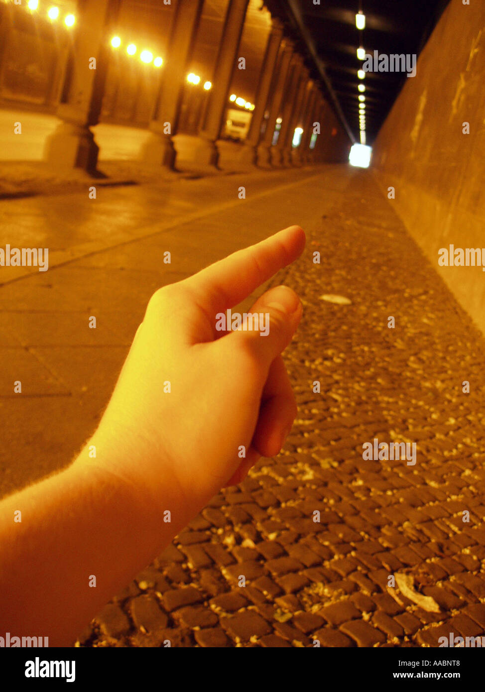 Finger shows a direction Stock Photo - Alamy