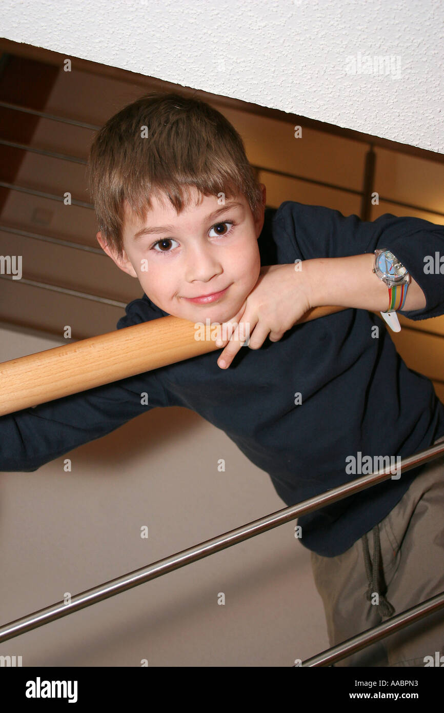 boy at railing Stock Photo - Alamy