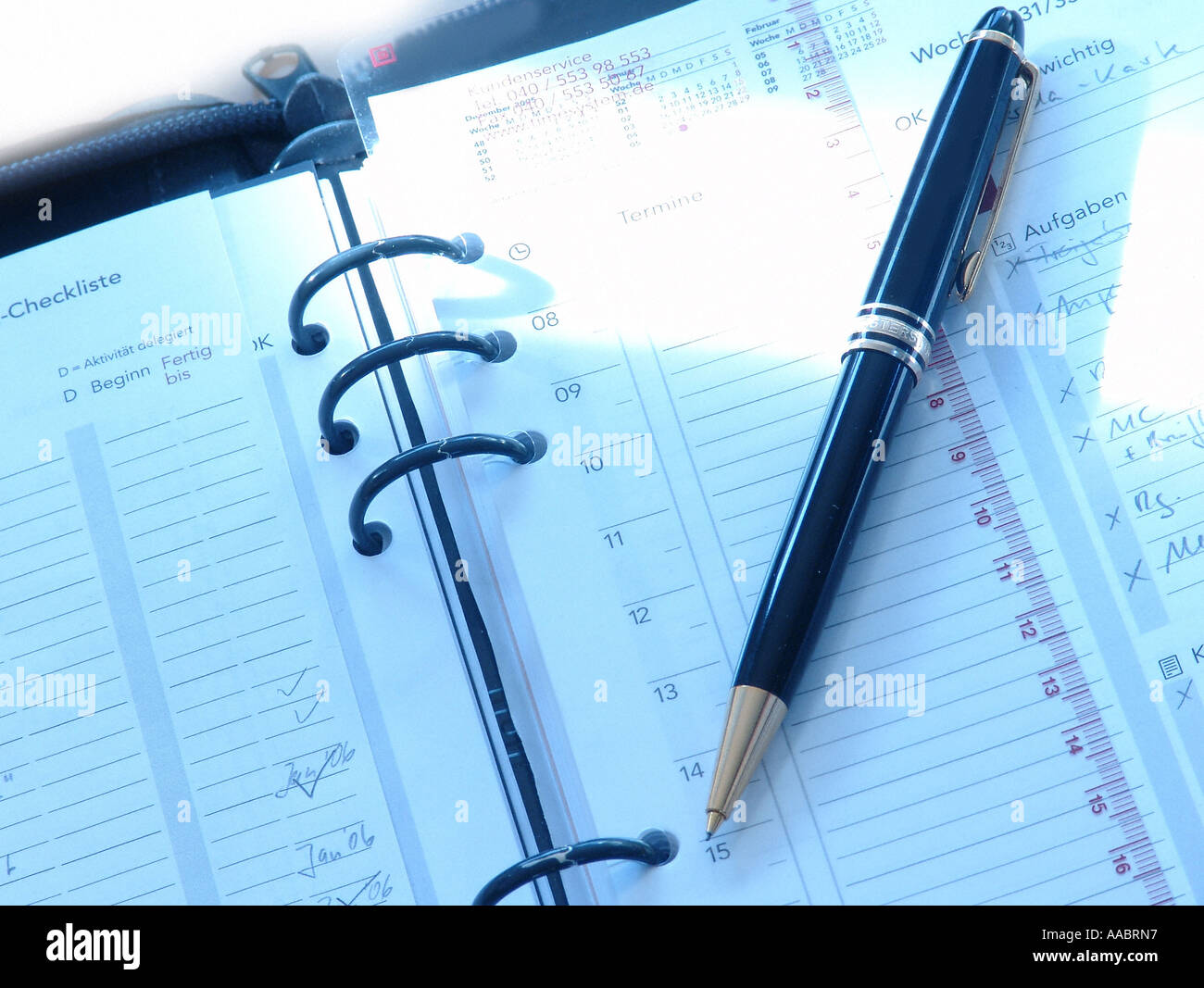 timer with pen Stock Photo - Alamy