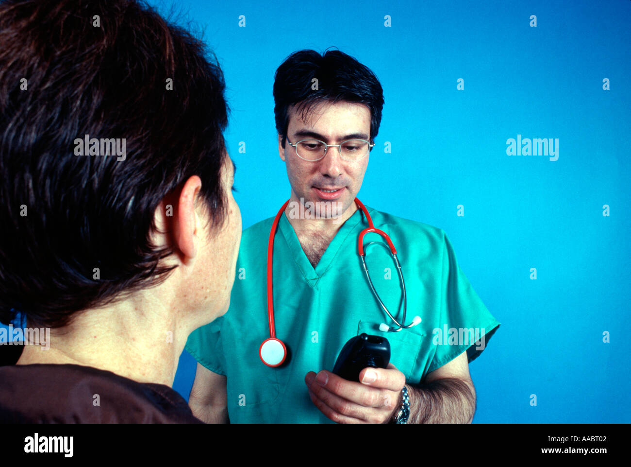 Doctor and patient Stock Photo - Alamy