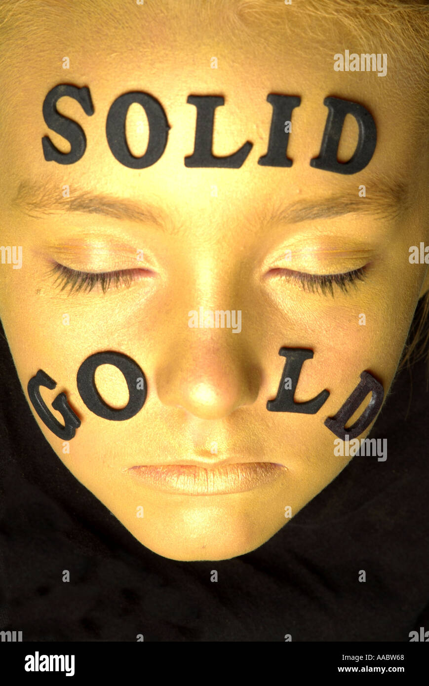 gold face girl gold face girl with eyes open screaming centre faced ...