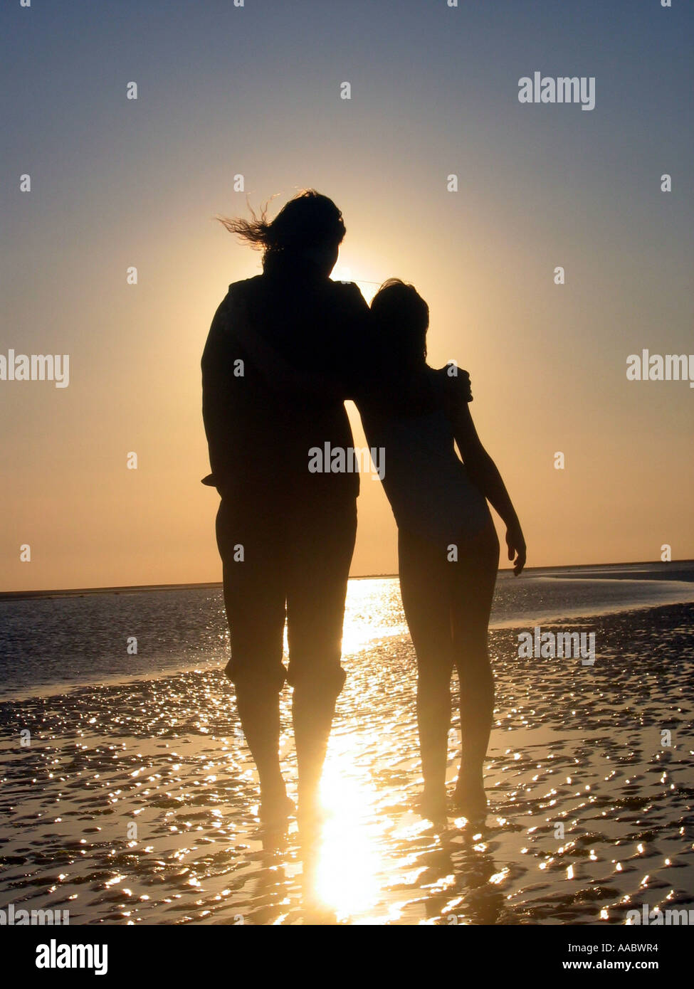 Amorous couple on beach hi-res stock photography and images - Alamy