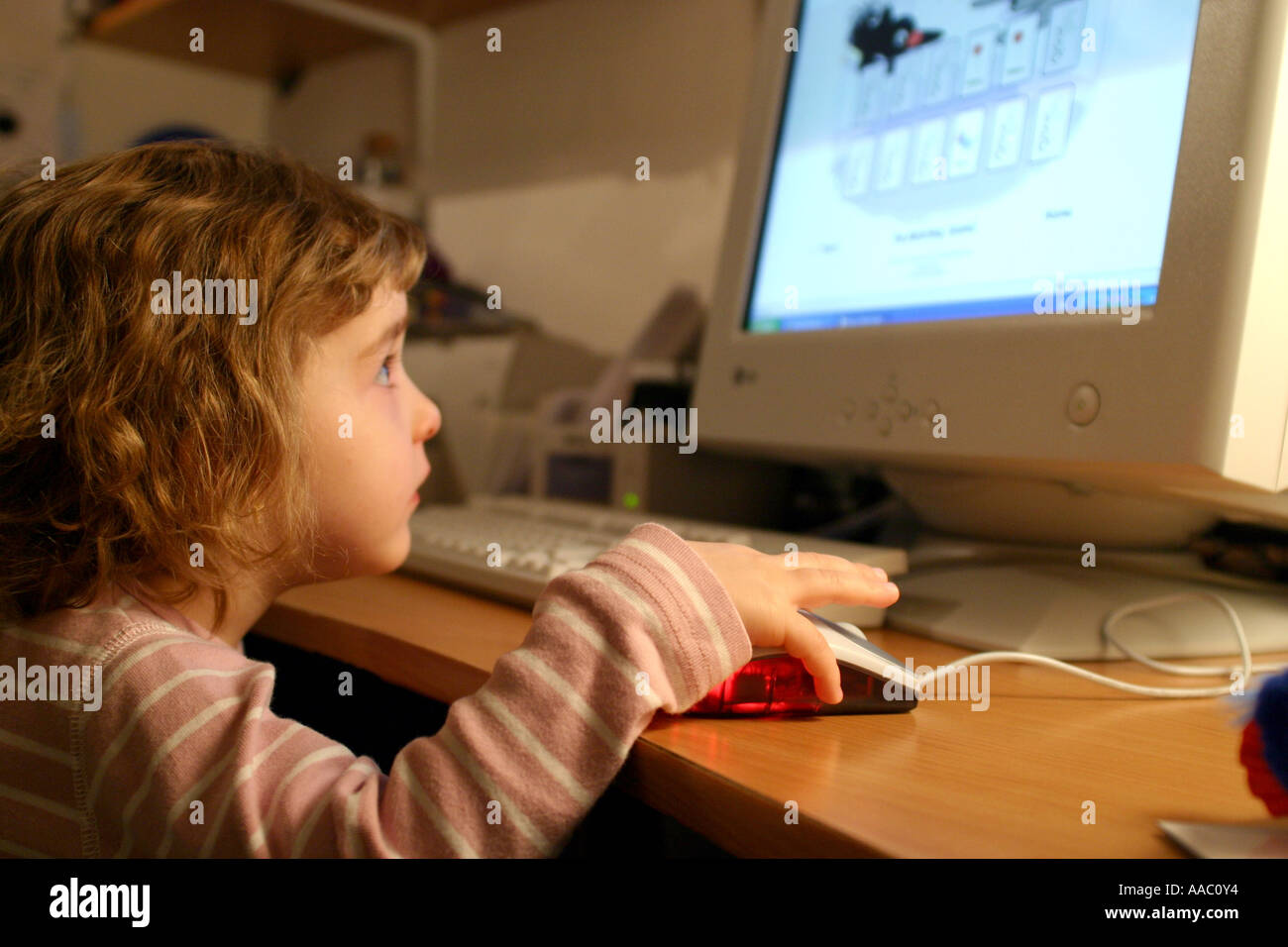 Child with computer Stock Photo - Alamy