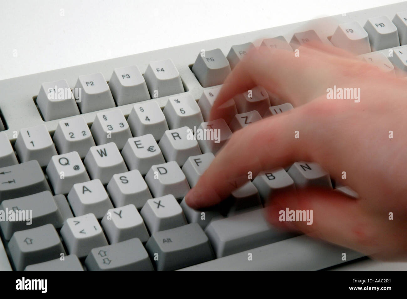 Hand with computer keyboard Stock Photo - Alamy