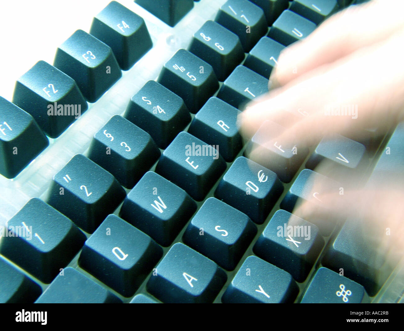 Hand with computer keyboard Stock Photo - Alamy