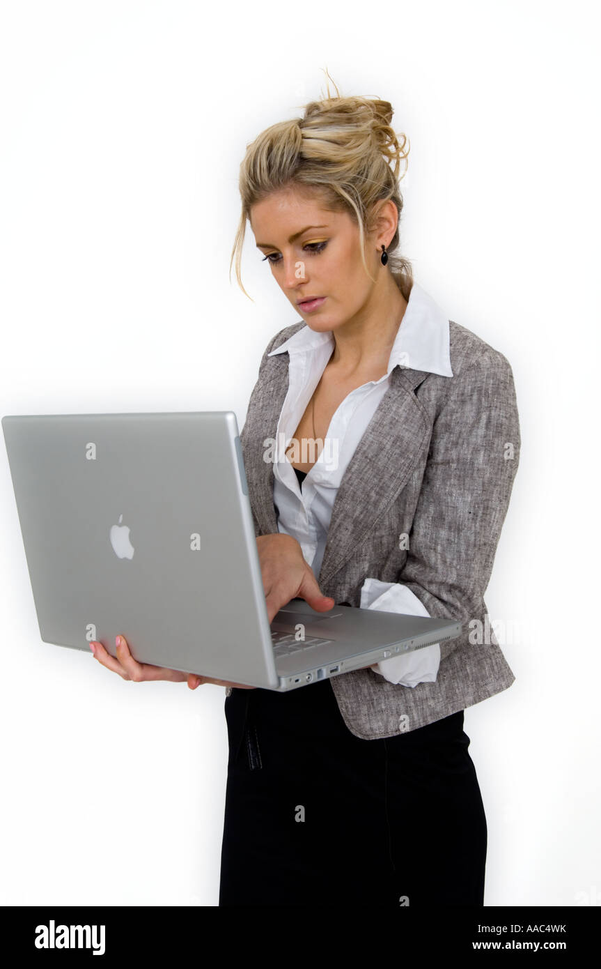 woman standing using a laptop computer Stock Photo - Alamy