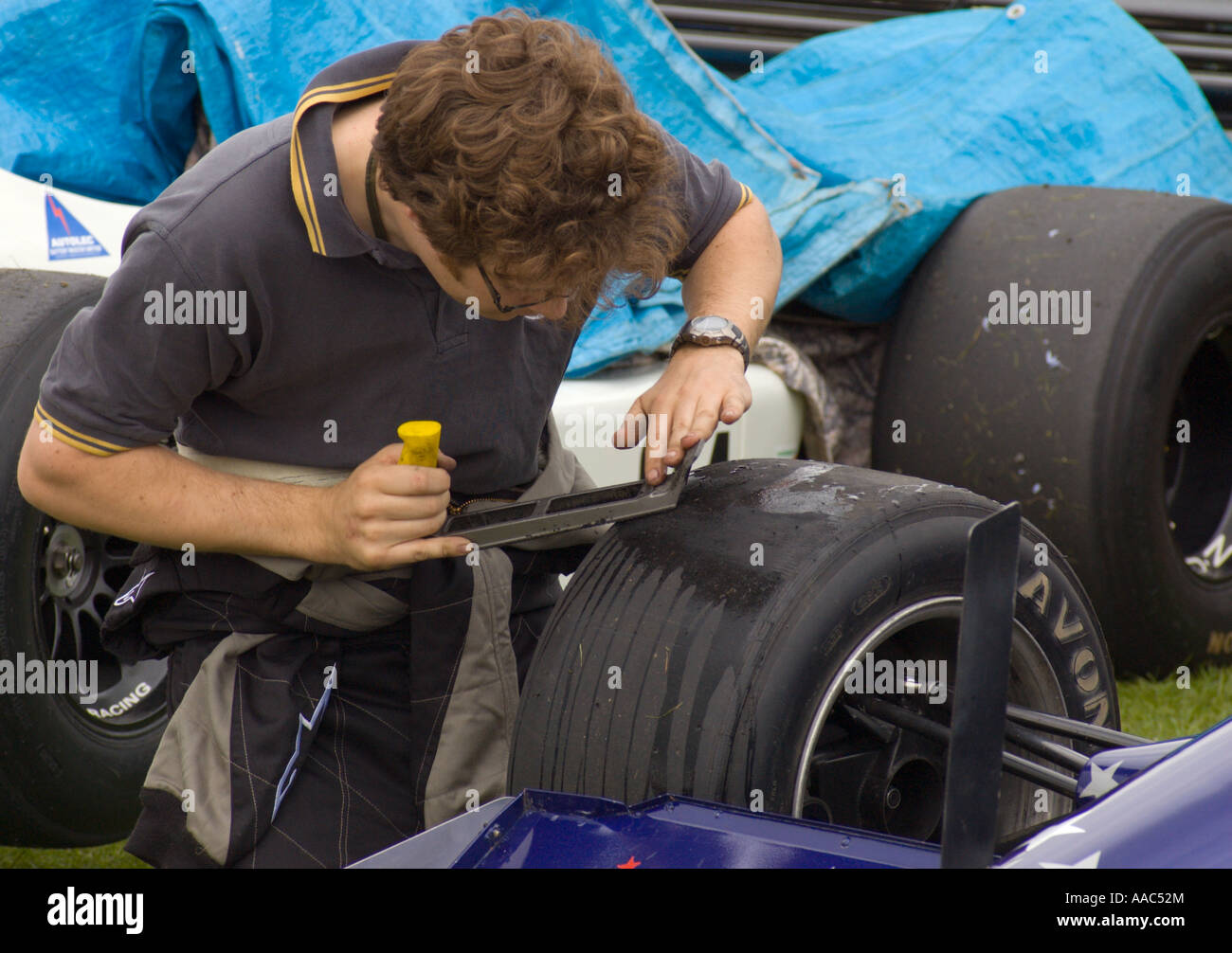 Race car tyre preparation Stock Photo - Alamy