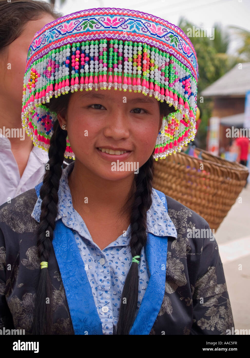 Hmong girl with headdress at Lao New Year Luang Prabang Stock Photo - Alamy