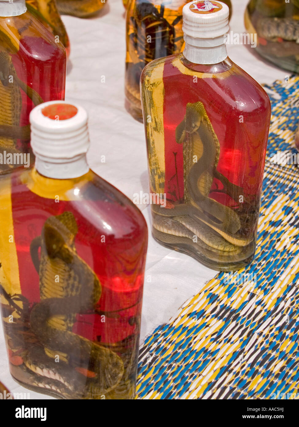 bottled snake alcohol on sale in chinese market Luang Prabang Laos ...