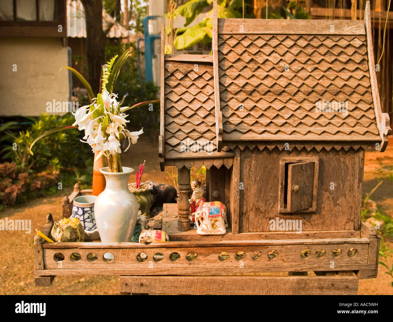 Offerings at a buddhist shrine hi-res stock photography and images - Alamy