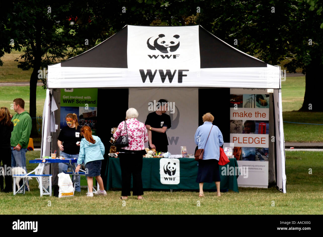 Charity stand at festival hi-res stock photography and images - Alamy
