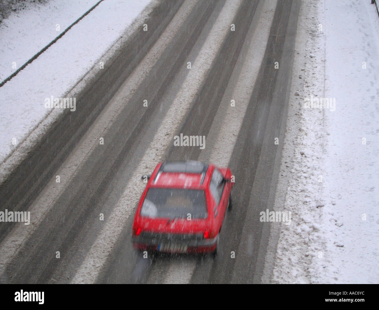 Car in the slush Stock Photo - Alamy