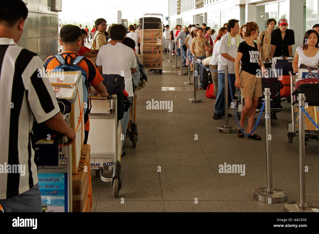 Queue at Manila International Airport Philippines Stock Photo - Alamy