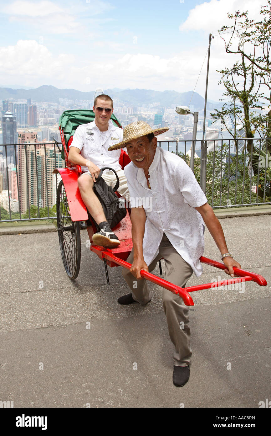 Coolie and rickshaw The Peak Hong Kong SAR China Stock Photo - Alamy