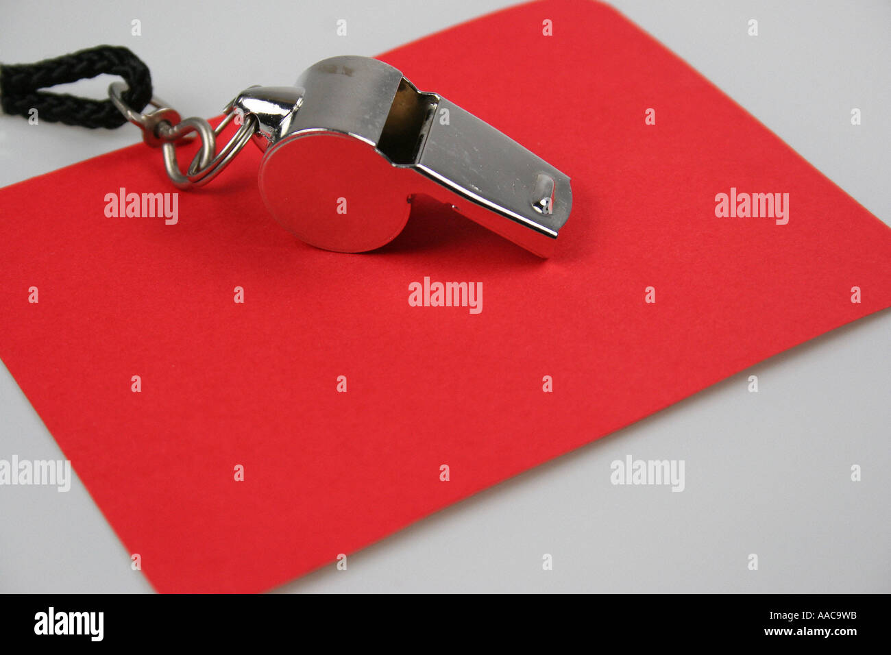 red card and whistle Stock Photo - Alamy