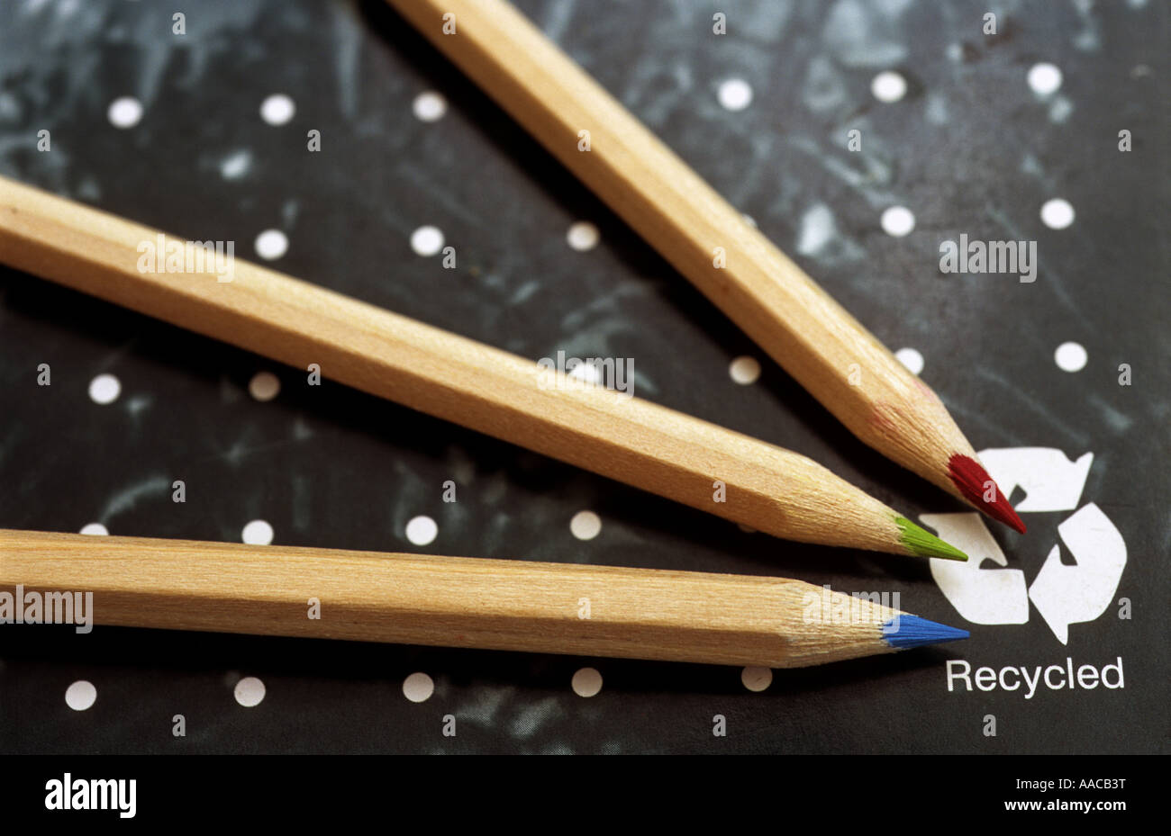 Coloured pencils and recycled sketch book Stock Photo - Alamy