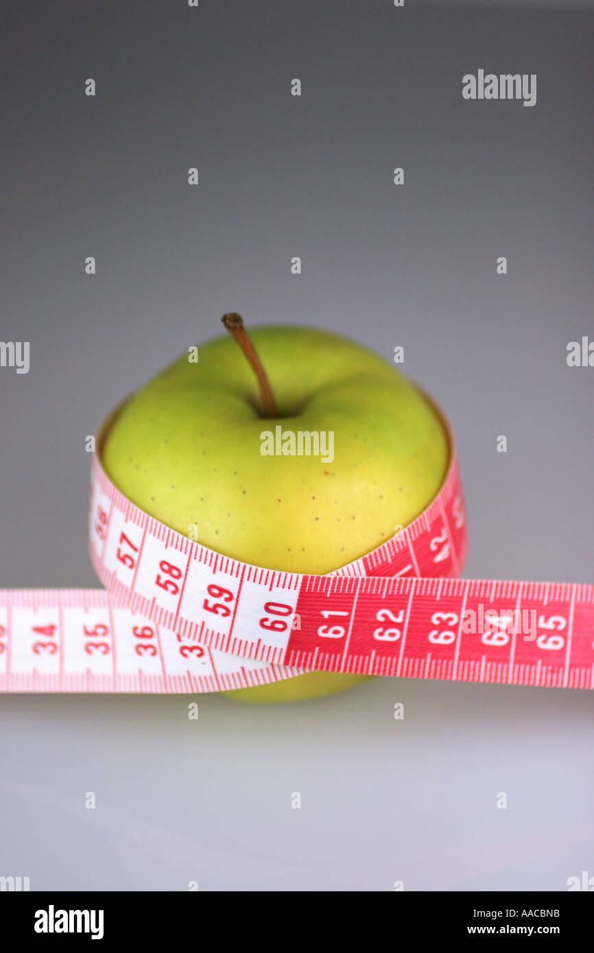 apple with tape measure Stock Photo - Alamy