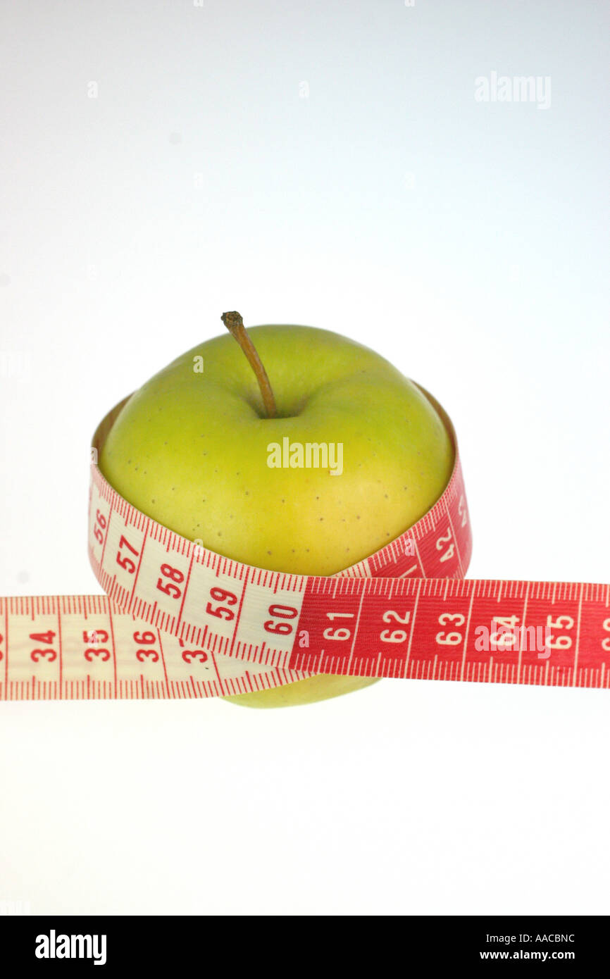 apple with tape measure Stock Photo - Alamy