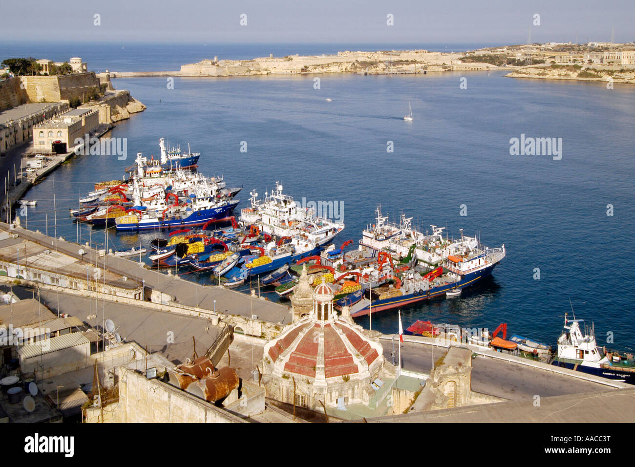 Cargo ships in Grand Harbour Malta Stock Photo - Alamy