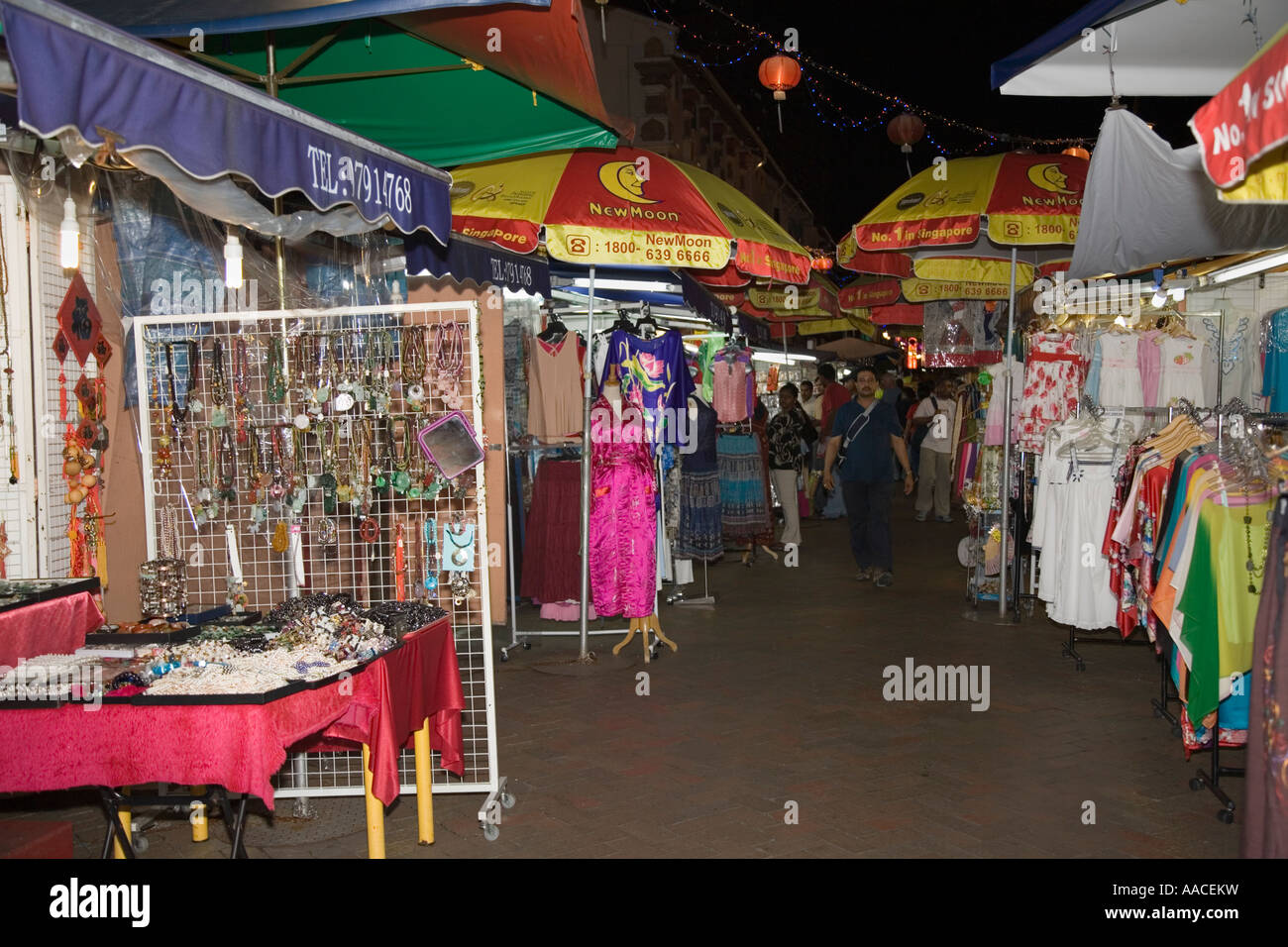 Busy shops and stalls on Pagoda Street selling colourful Chinese goods ...