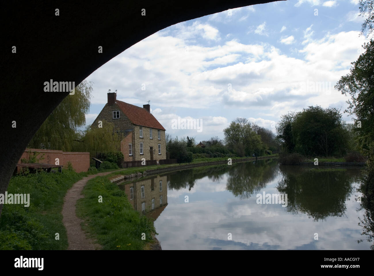 The Grand Union canal in Milton Keynes bridge Linford Park wood Stock ...