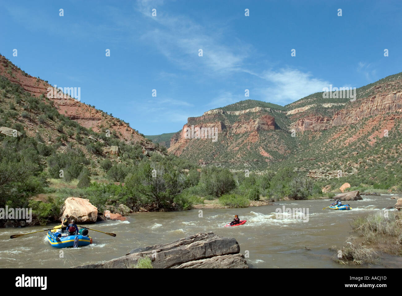 Colorado Dolores River rafts and kayaks making thier way down the river ...
