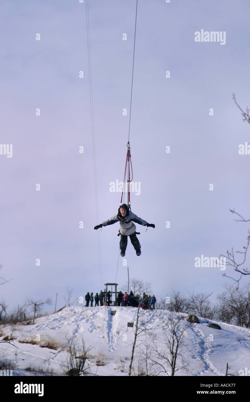 Riding the zip line Stock Photo - Alamy