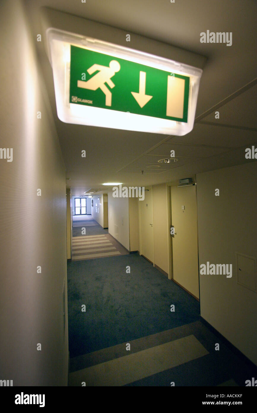 Emergency exit sign in a hotel Stock Photo - Alamy