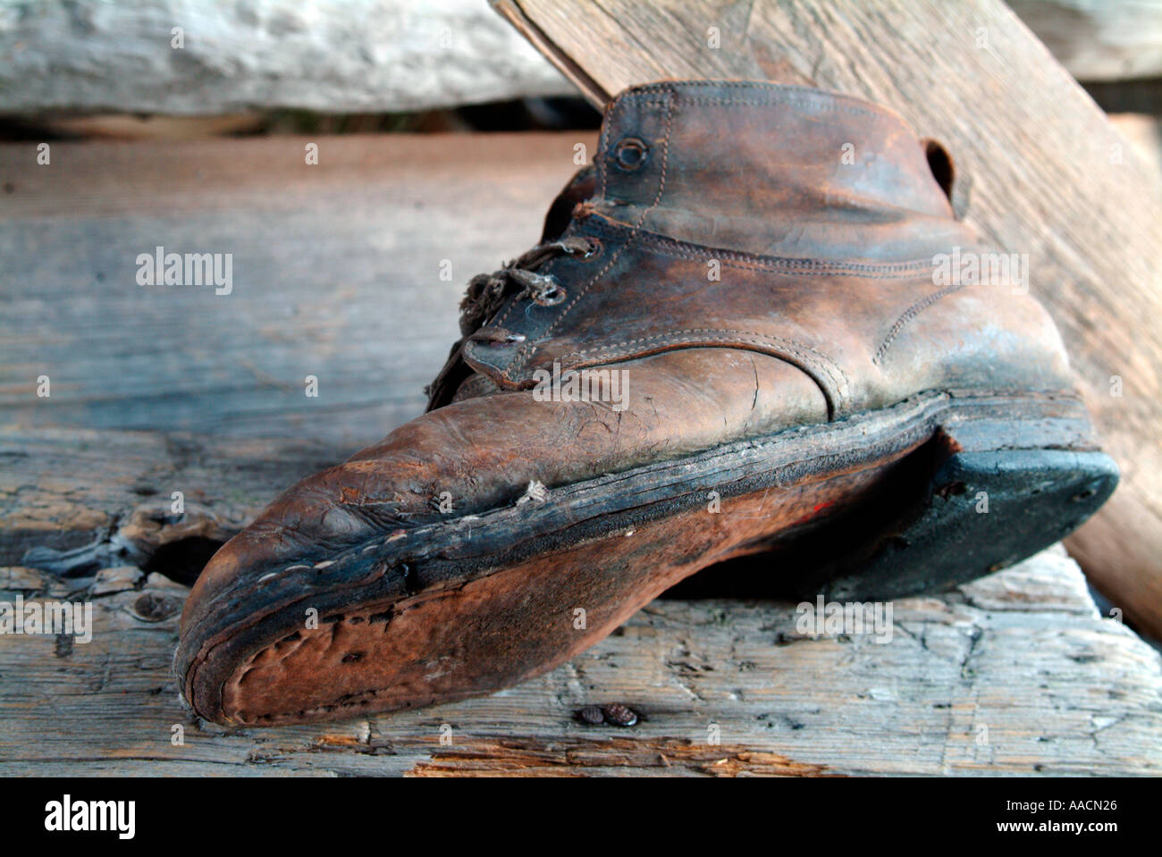 old leather shoe on old wood Stock Photo - Alamy