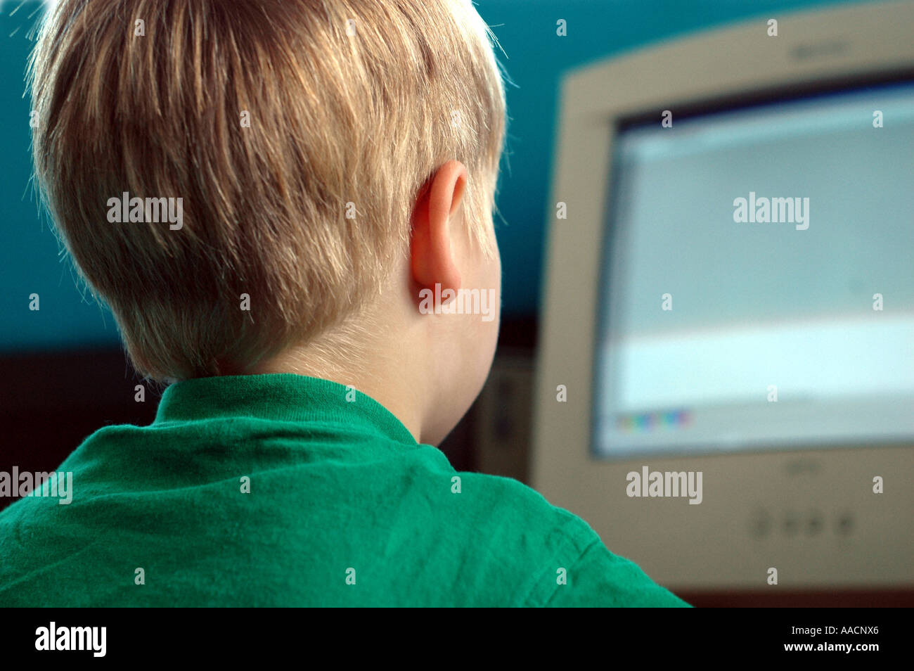 Child in front of computer Stock Photo - Alamy