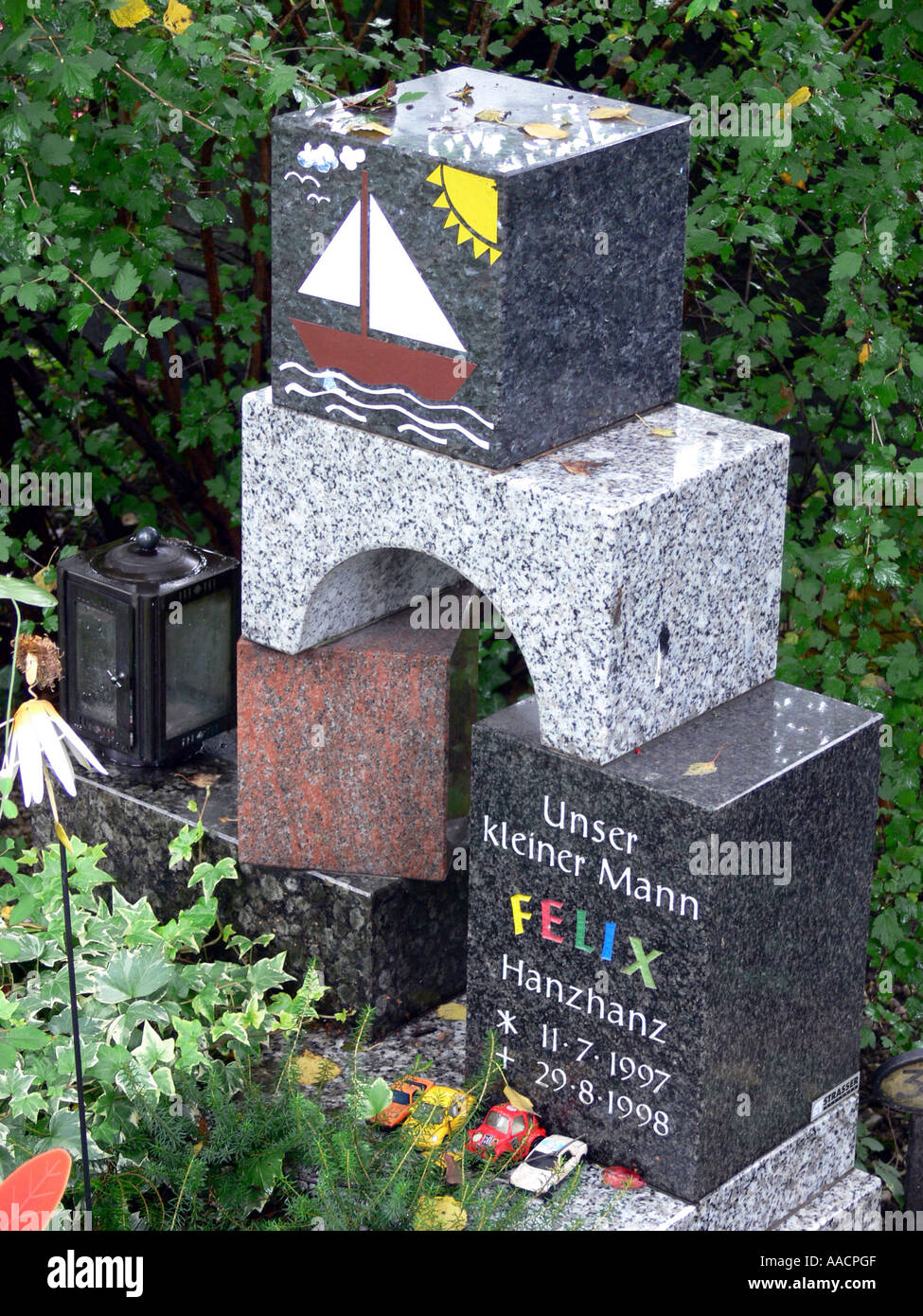 Cemetery, grave of a child Stock Photo - Alamy