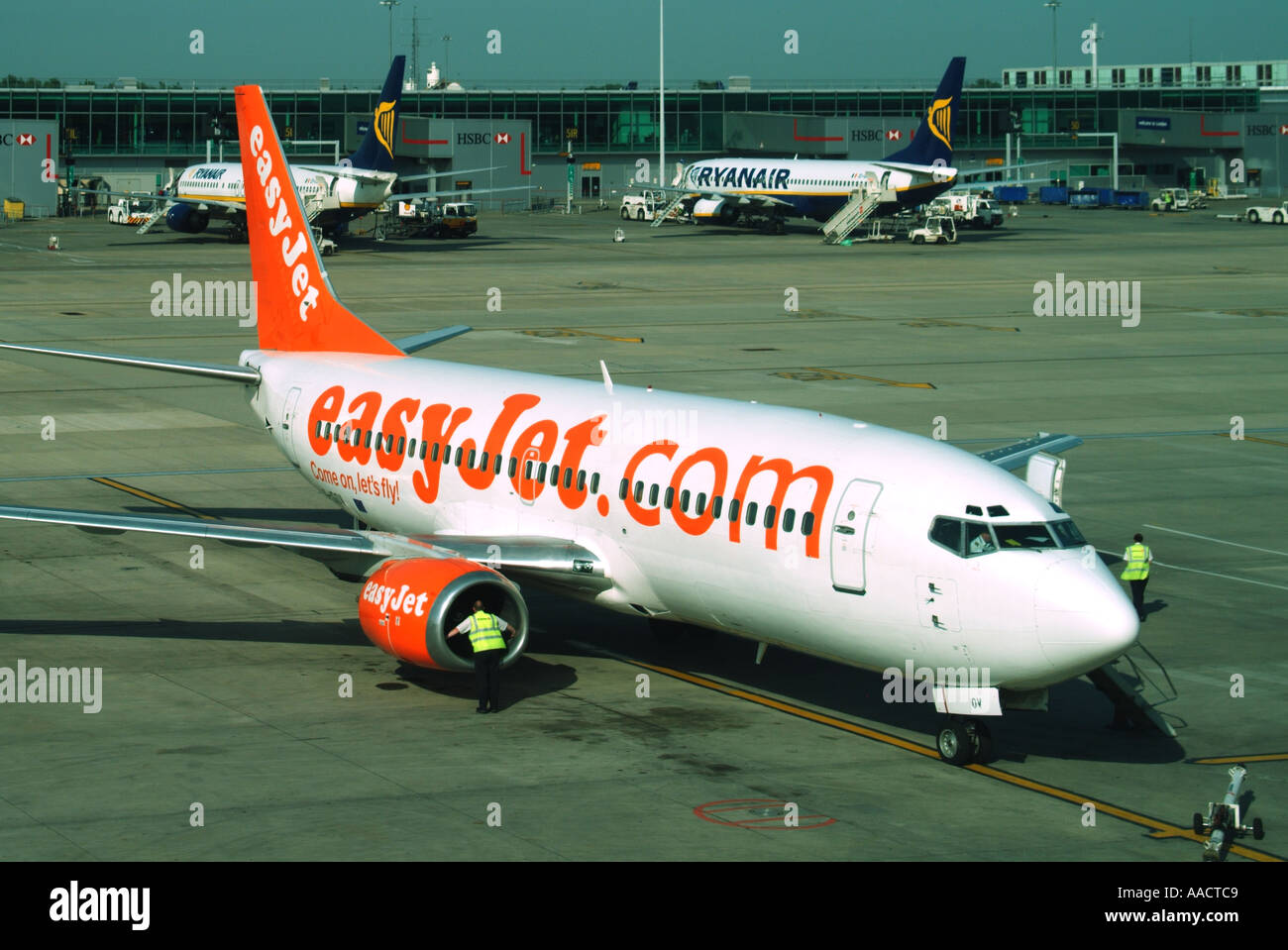 London Stansted Airport close up EasyJet aircraft and 2 distant two ...