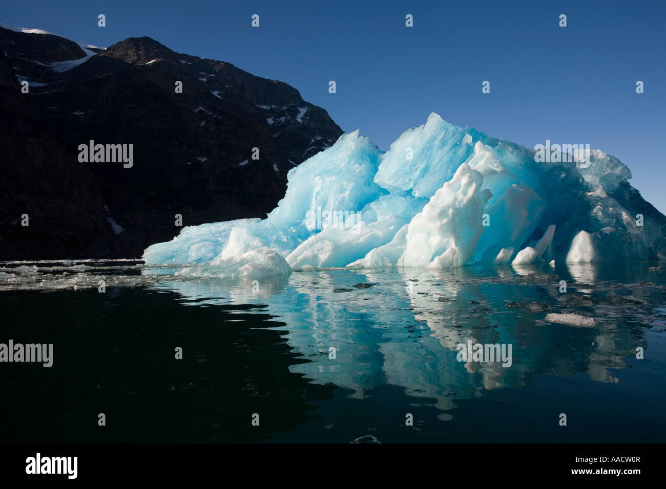 Greenland Aappilattoq Deep blue iceberg from Nuup Kangerlua floating in ...