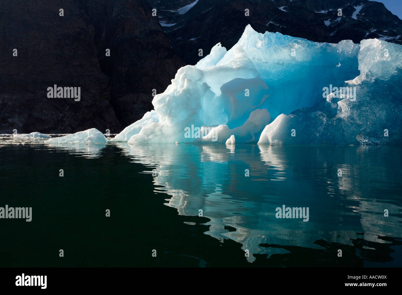 Greenland Aappilattoq Deep blue iceberg from Nuup Kangerlua floating in ...