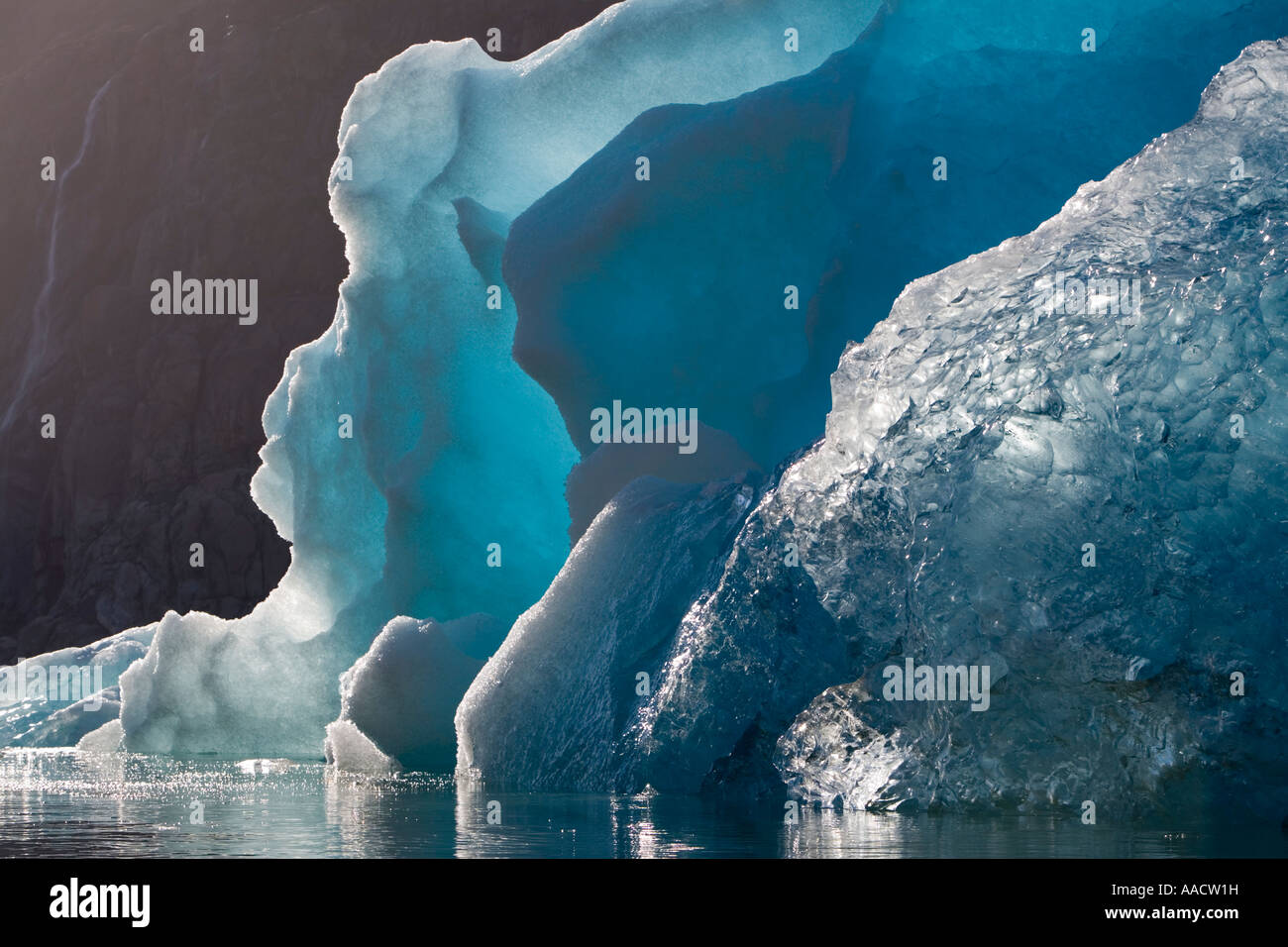 Greenland Aappilattoq Deep blue iceberg from Nuup Kangerlua floating in ...