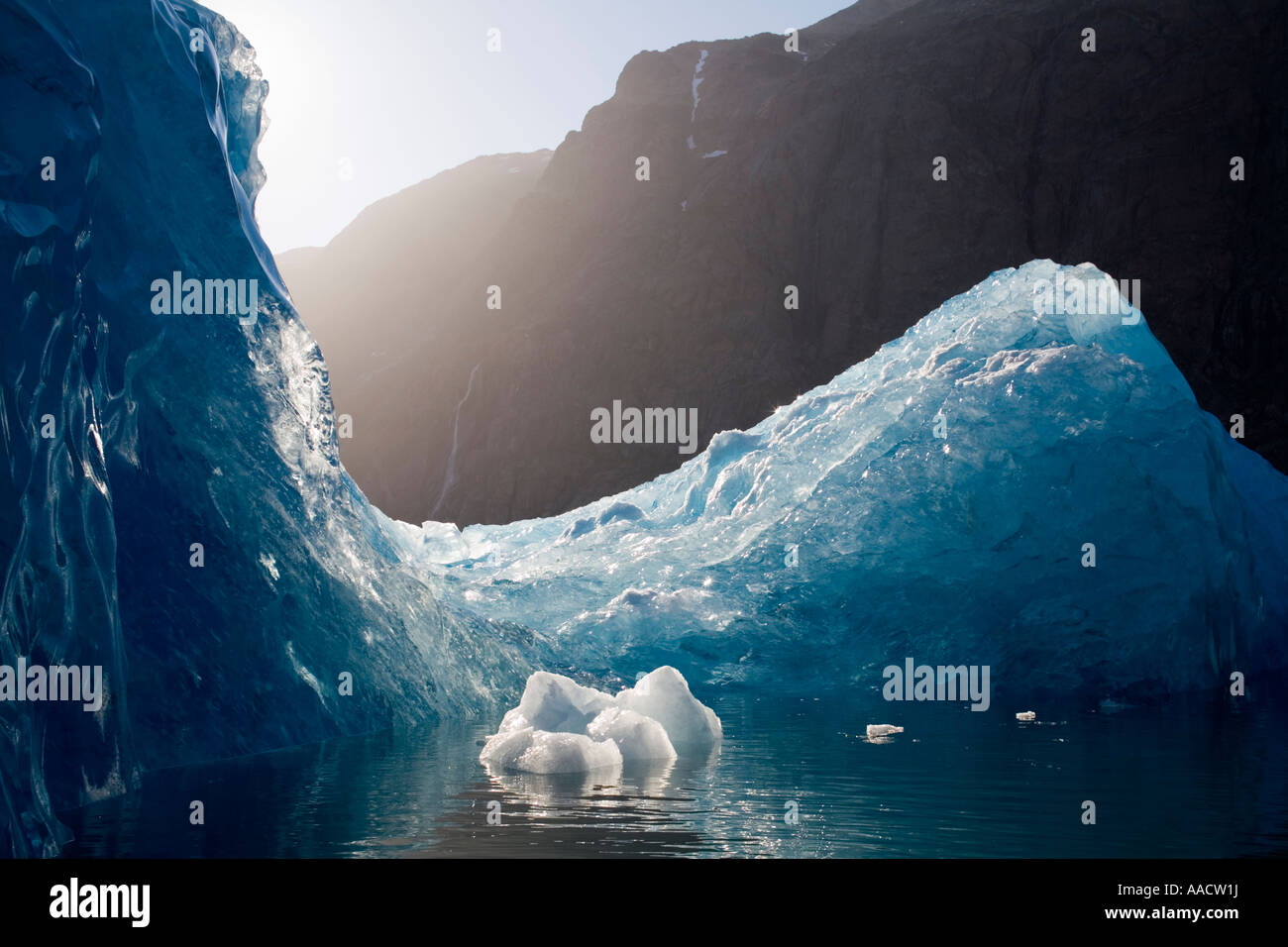 Greenland Aappilattoq Deep blue iceberg from Nuup Kangerlua floating in ...
