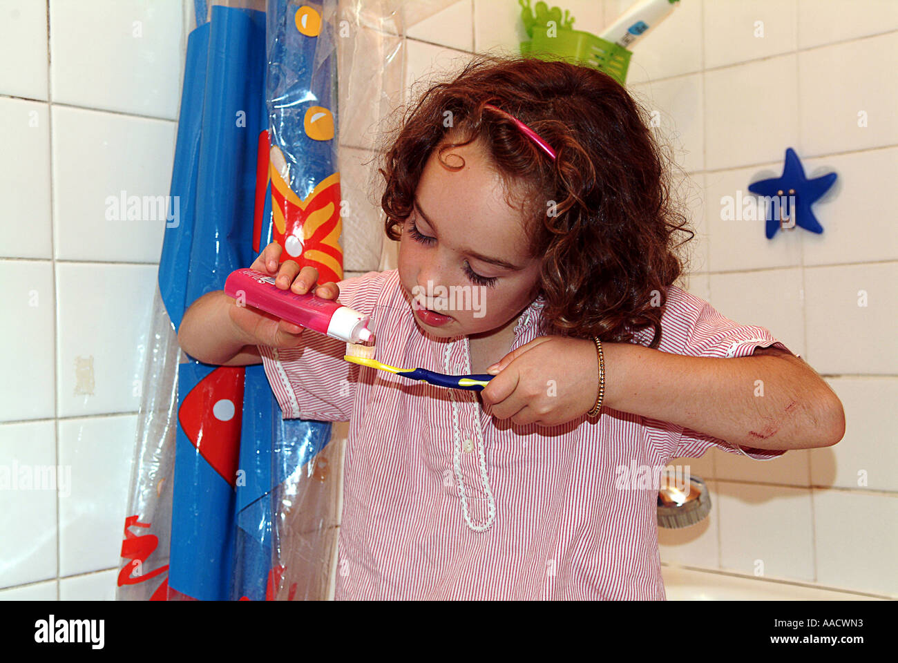 Camille is going to brush her teeth Stock Photo - Alamy